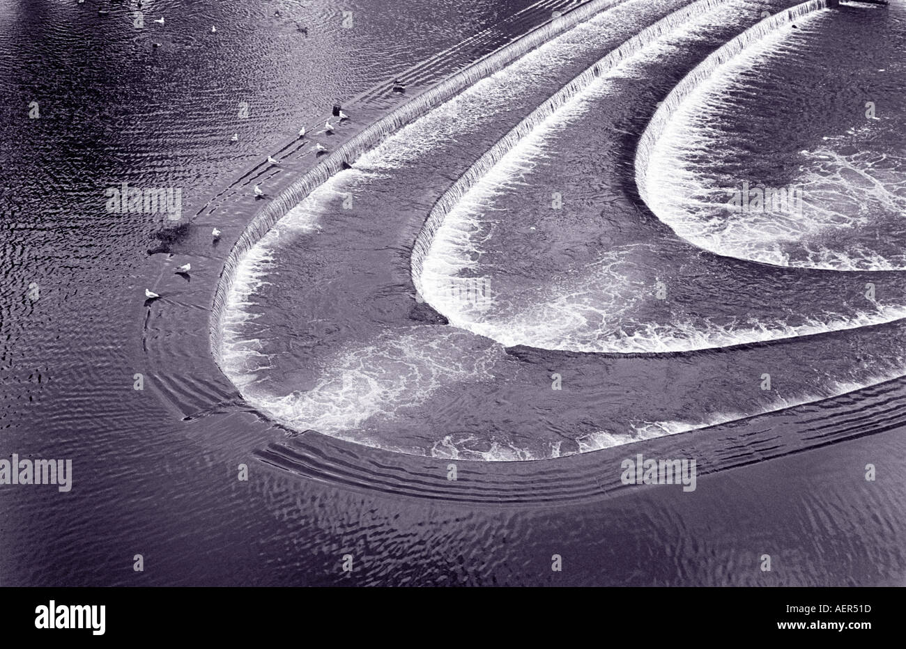 Curved pattern of weir on river in Bath Avon England Stock Photo - Alamy
