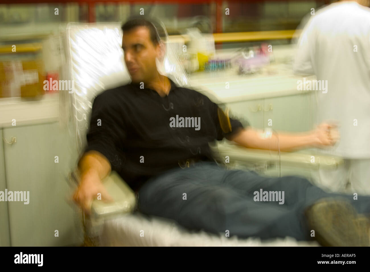 36 years old man is about to give blood in a hospital at Greece Stock ...