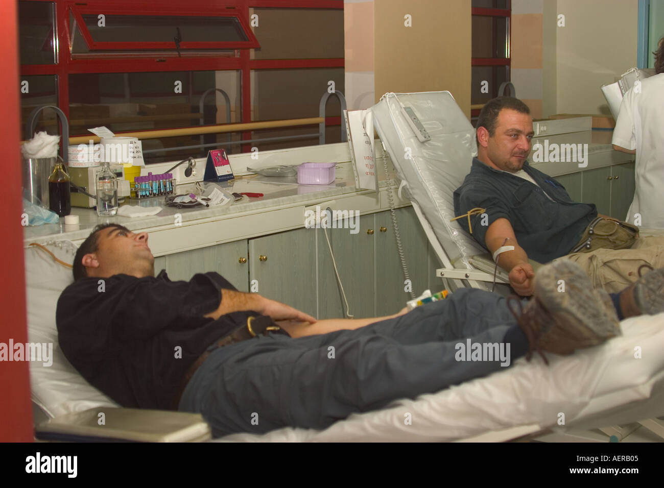 36 years old man is about to give blood in a hospital at Greece Stock ...