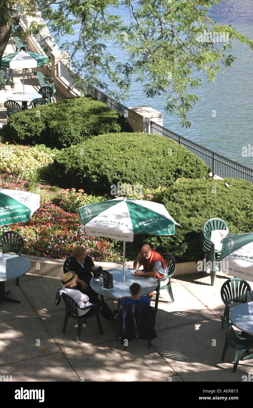People sitting at a riverfront cafe Stock Photo - Alamy