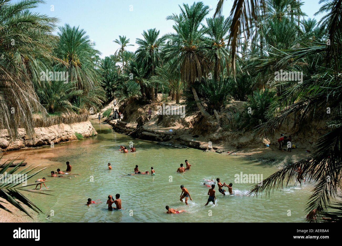 playing children oasis of nefta tunisia Stock Photo - Alamy