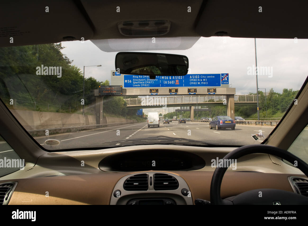 The view through the windscreen of a car travelling on the english ...