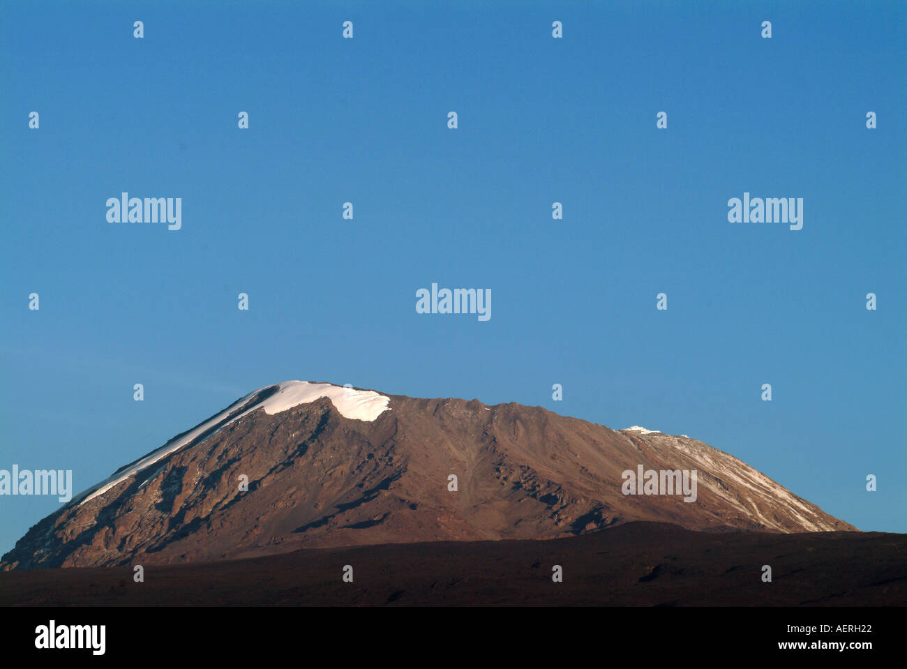 Mount Kilimanjaro seen from the nearby town of Moshi. Tanzania, Africa ...