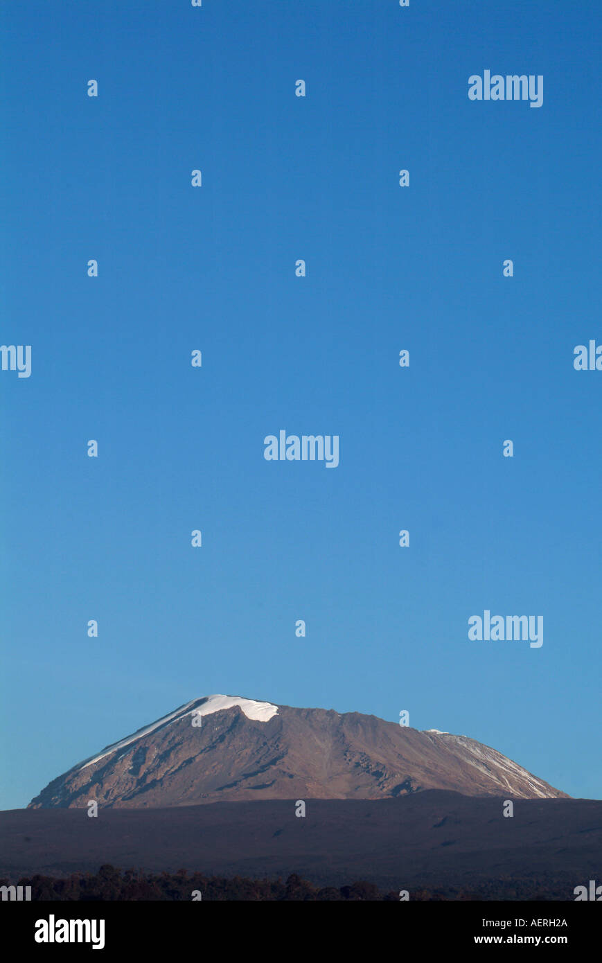 Mount Kilimanjaro seen from the nearby town of Moshi. Tanzania, Africa ...