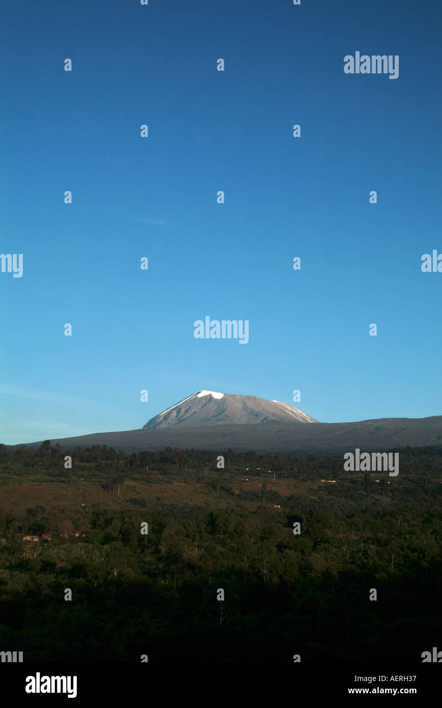 Mount Kilimanjaro seen from the nearby town of Moshi. Tanzania, Africa ...
