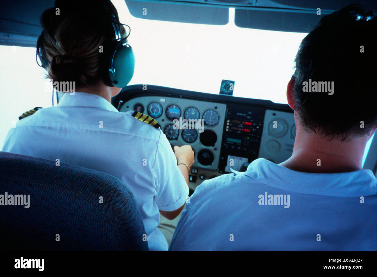 Woman cockpit pilot passenger hi-res stock photography and images - Alamy