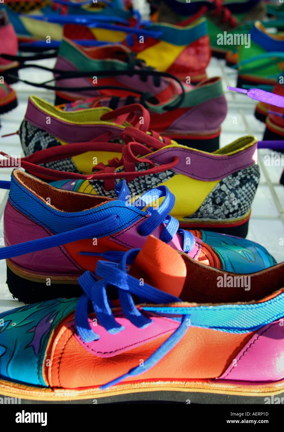 A rack of colourful shoes Stock Photo - Alamy