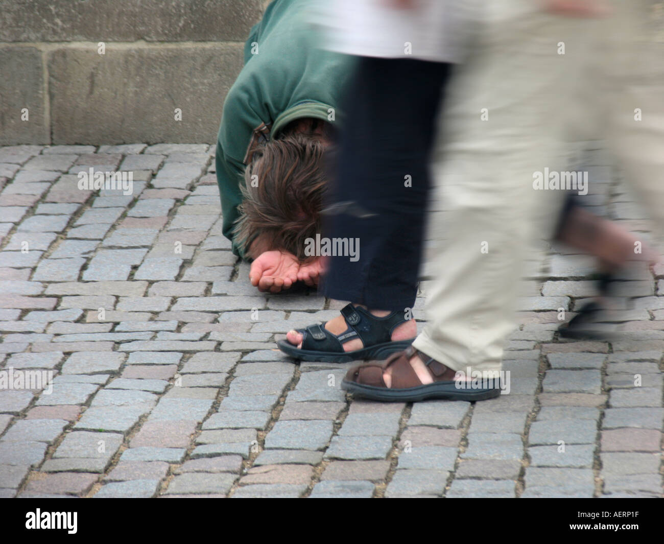 Ignoring beggar hi-res stock photography and images - Alamy