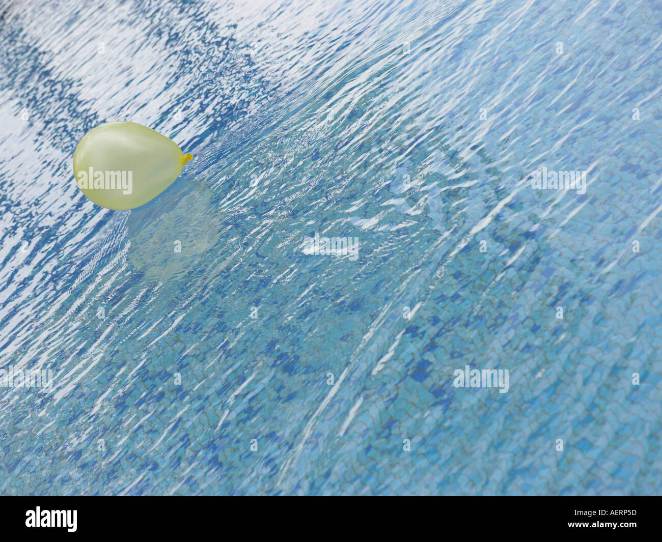 High angle view of a balloon floating in a swimming pool Stock Photo ...