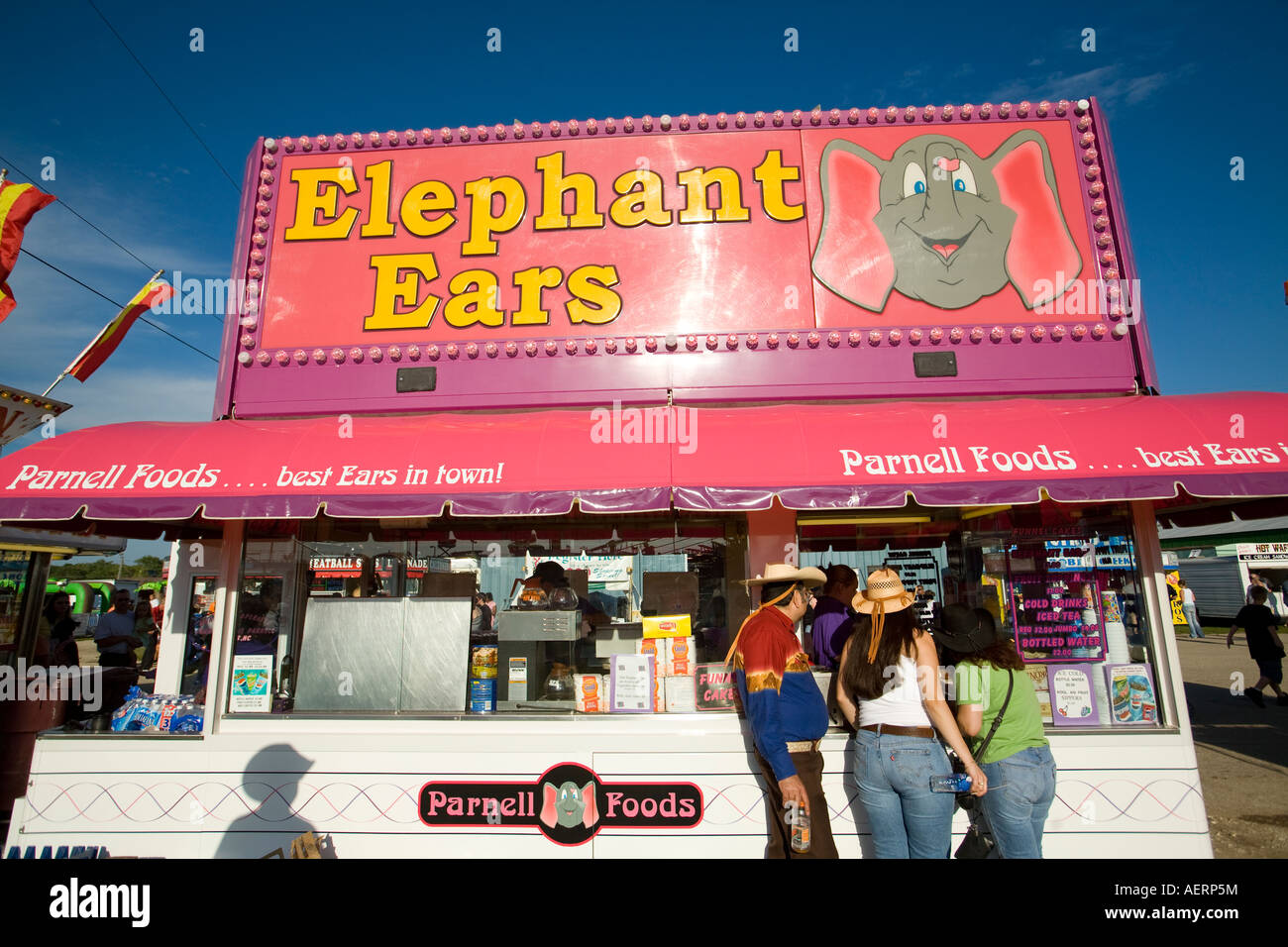 ILLINOIS Grayslake Three people stand at fast food booth window and ...