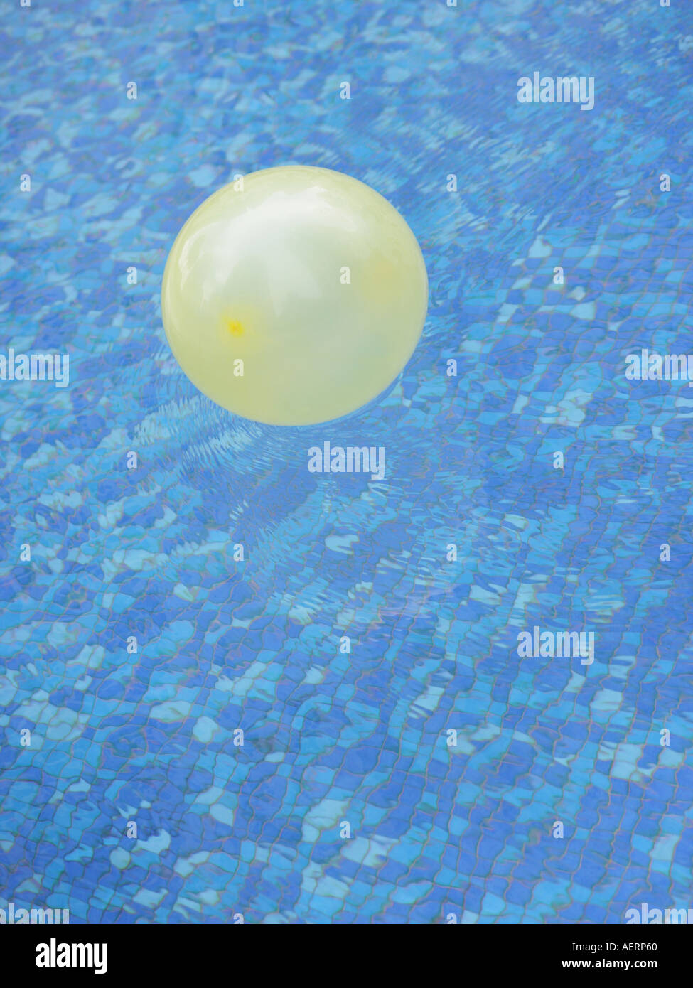 High angle view of a balloon floating in a swimming pool Stock Photo ...