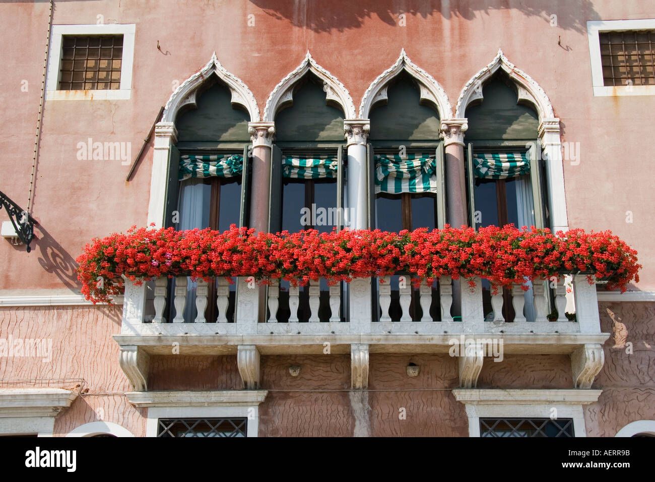 Gothic windows and flower boxes San Marco area Venice Italy Stock Photo ...