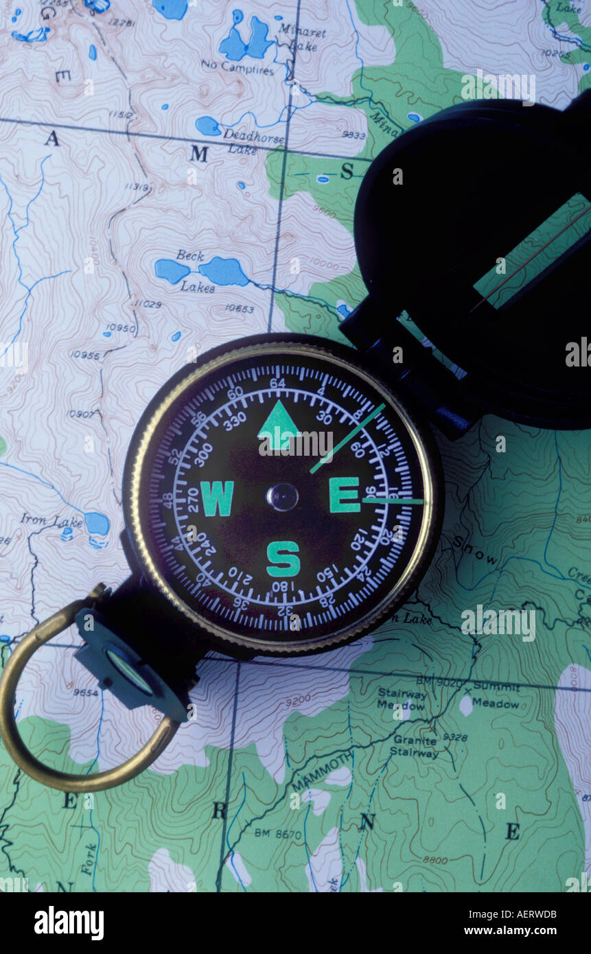 Modern compass on map Stock Photo - Alamy