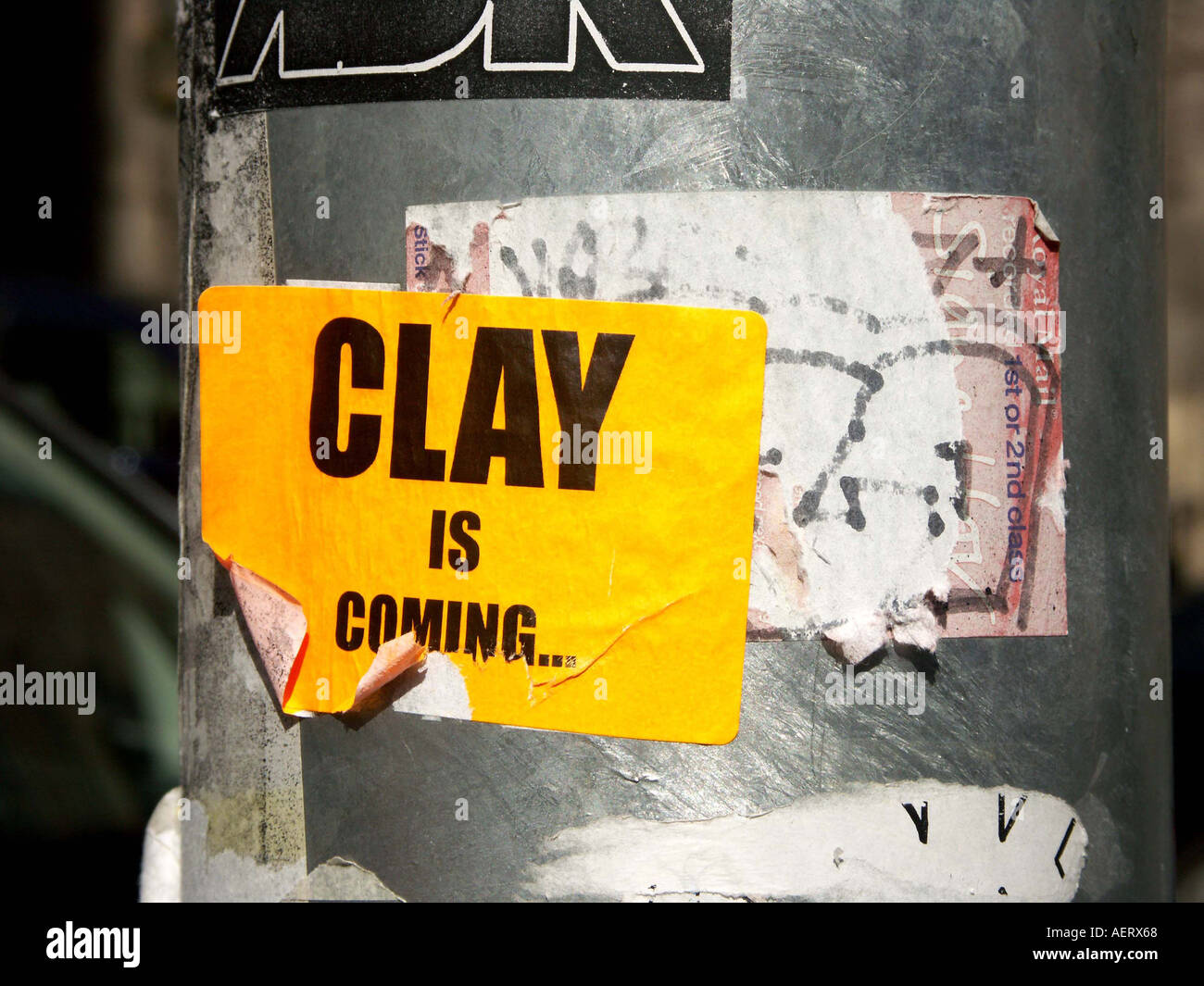 sticker graffiti on a lamp post in edinburgh scotland saying clay is ...