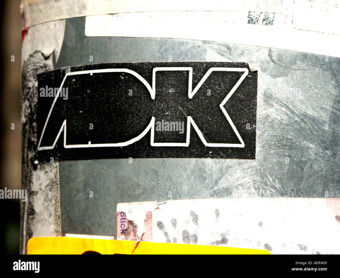 sticker graffiti on a lamp post in edinburgh scotland Stock Photo - Alamy