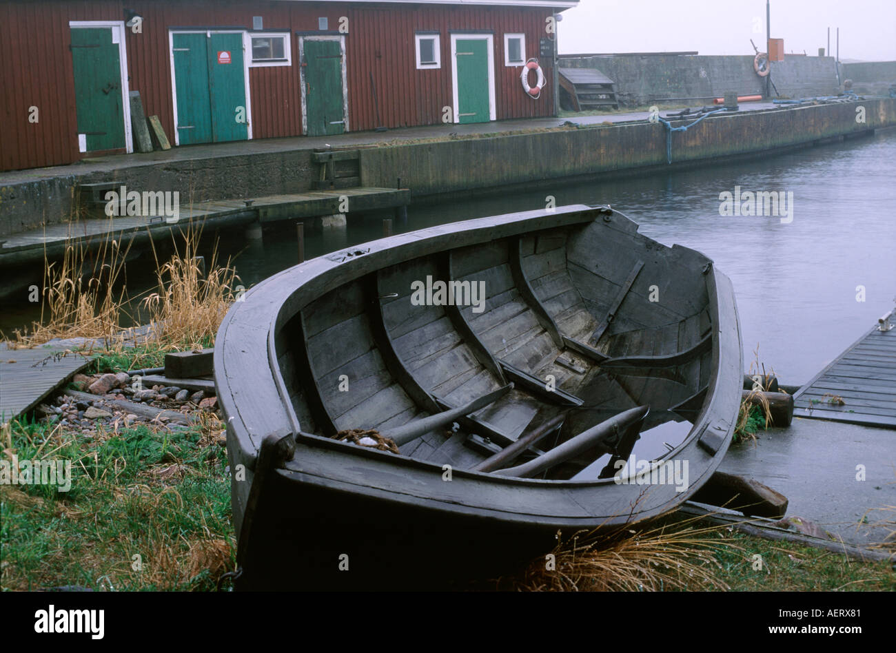 Rowing boat on land Stock Photo - Alamy