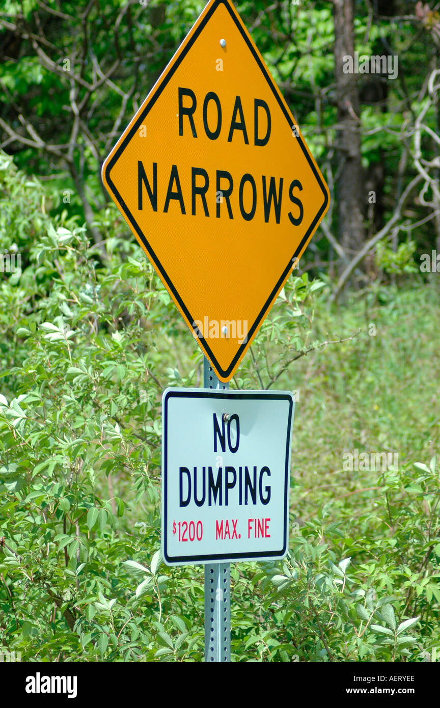 No Dumping sign as the Road Narrows sign on public road Stock Photo - Alamy
