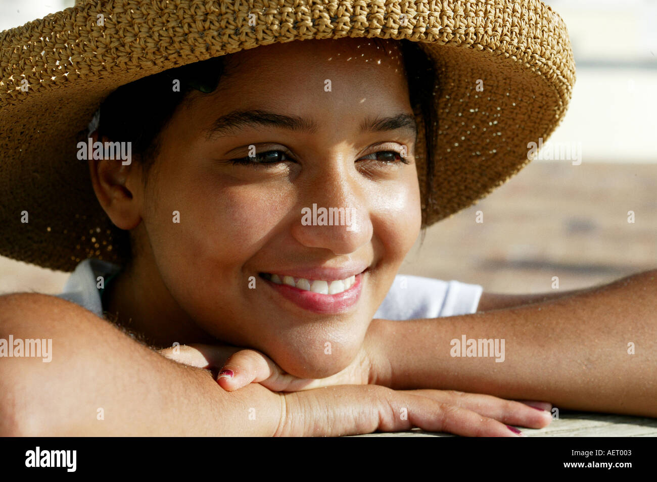 Young woman wearing straw hat Stock Photo - Alamy