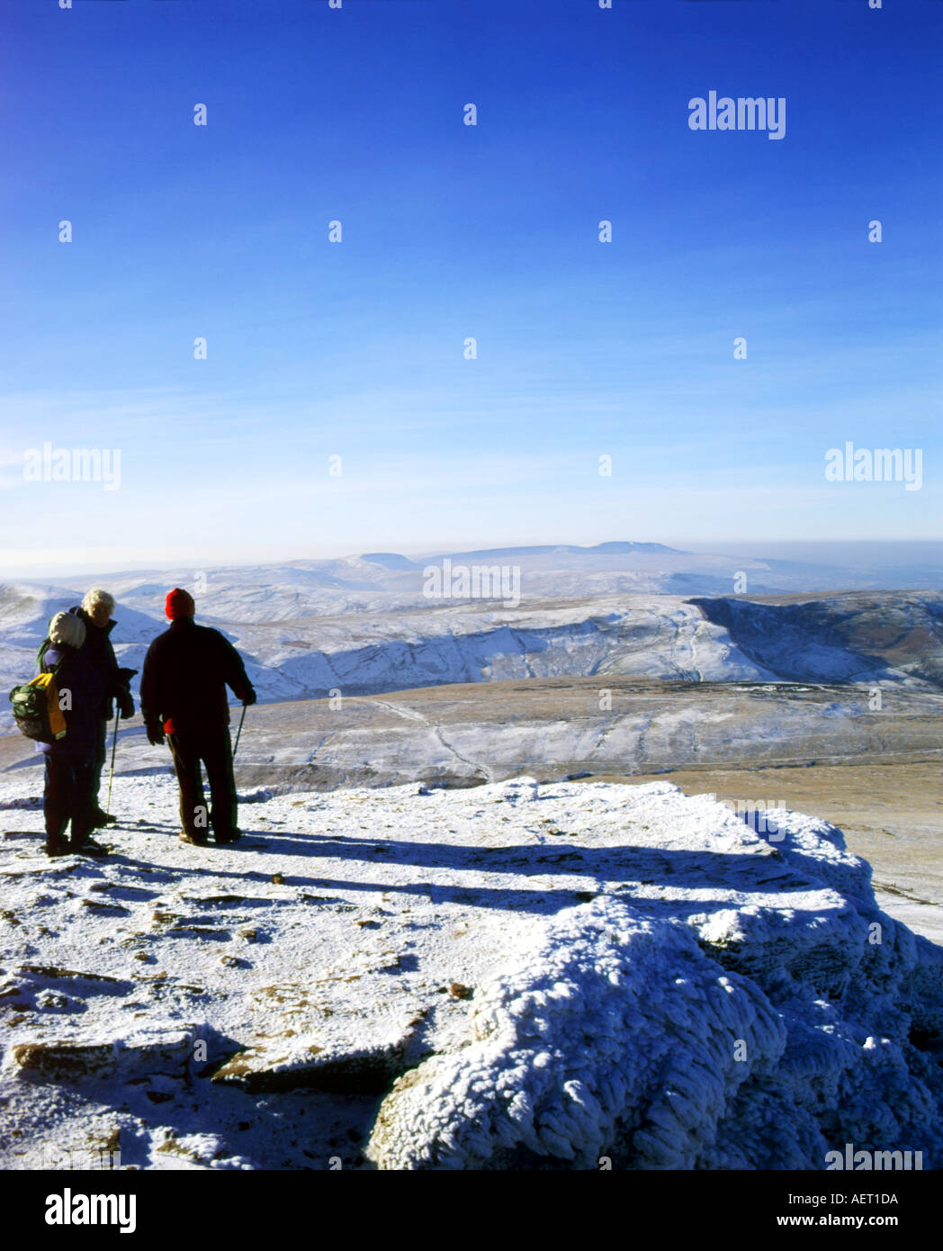 walkers on corn du during the winter brecon beacons national park wales ...