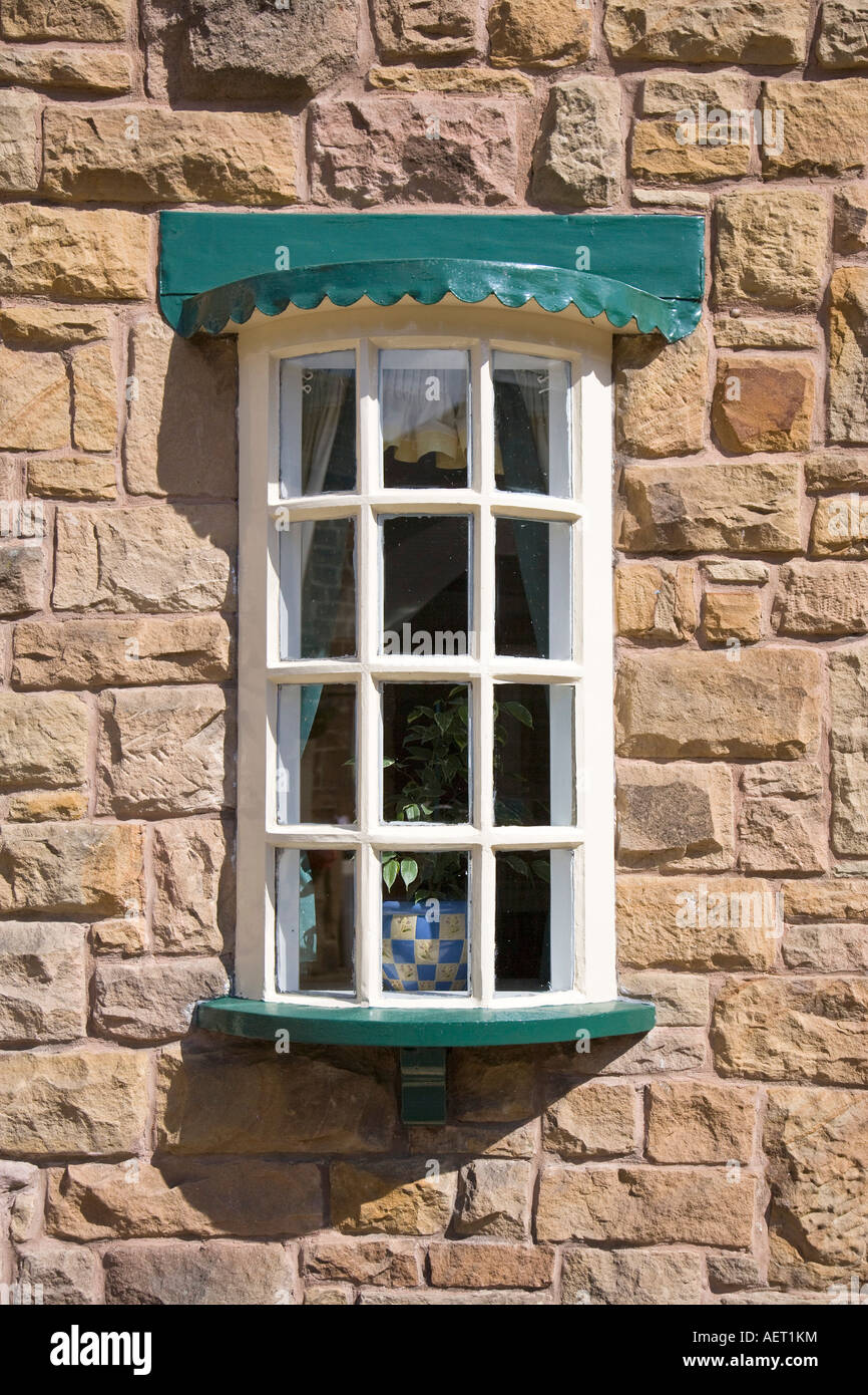 Traditional Bay Window with Leaded Glass Panes in Stone Wall UK ...