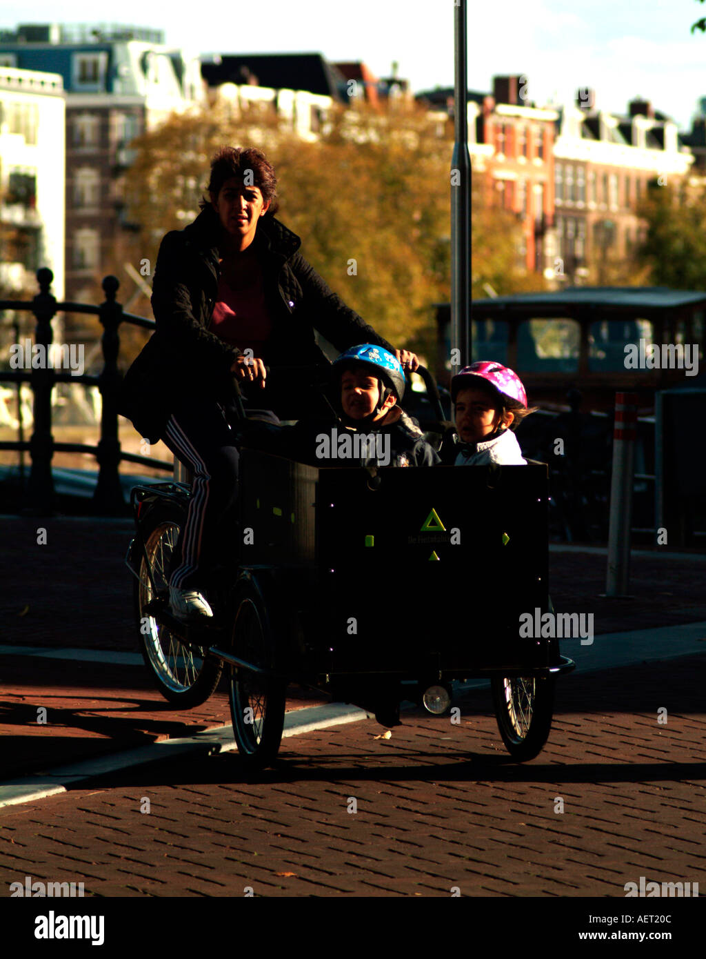 Woman transporting children hi-res stock photography and images - Alamy