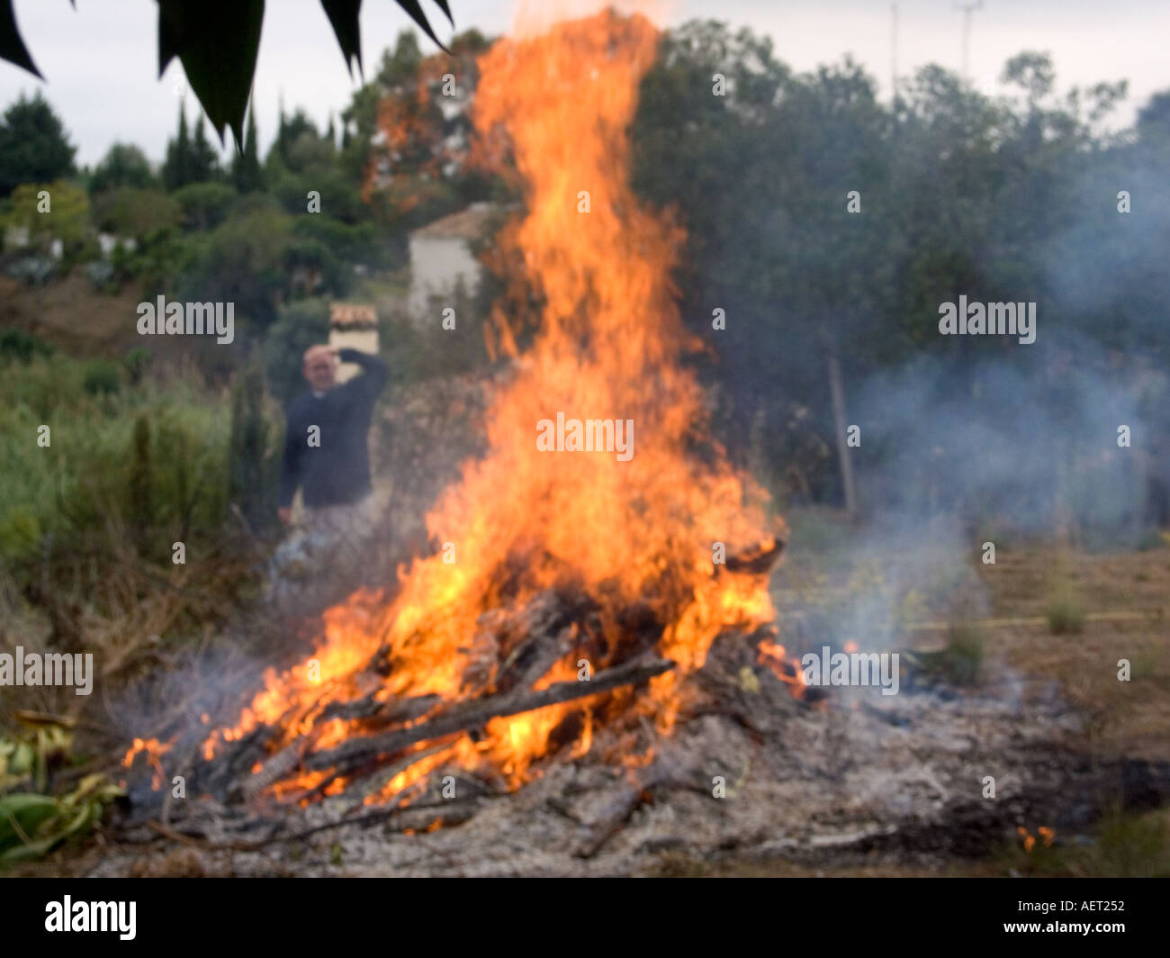 Tending the fire hi-res stock photography and images - Alamy