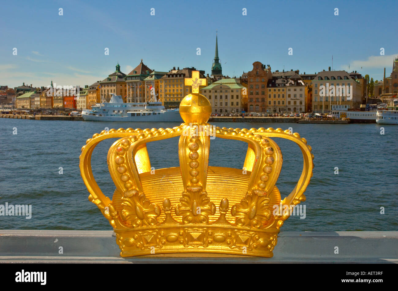 Crown the symbol of Sweden with Gamla Stan the old town district of ...