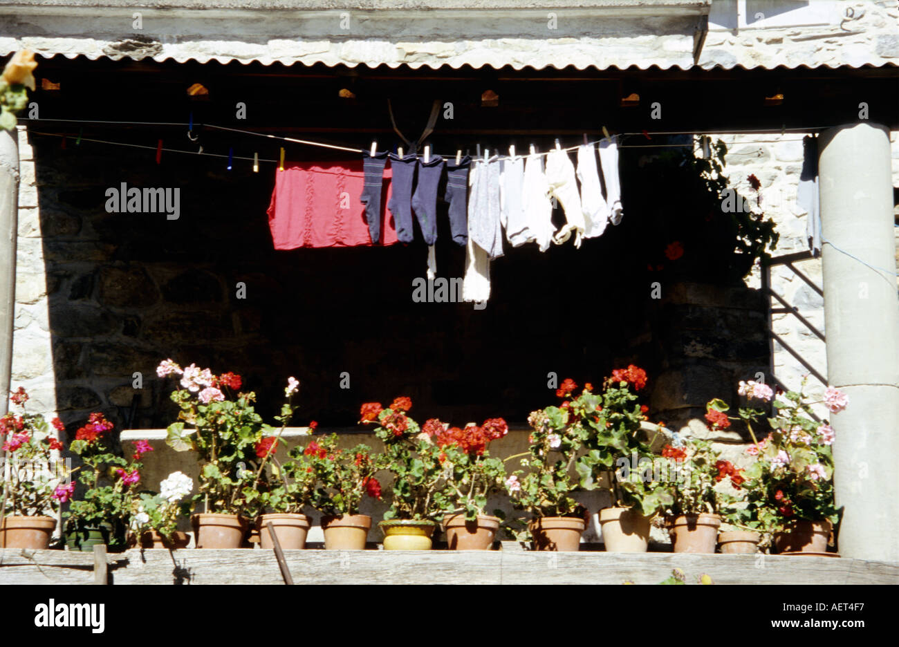 Washing line with clothes drying Lescun Pyrenees France Stock Photo - Alamy