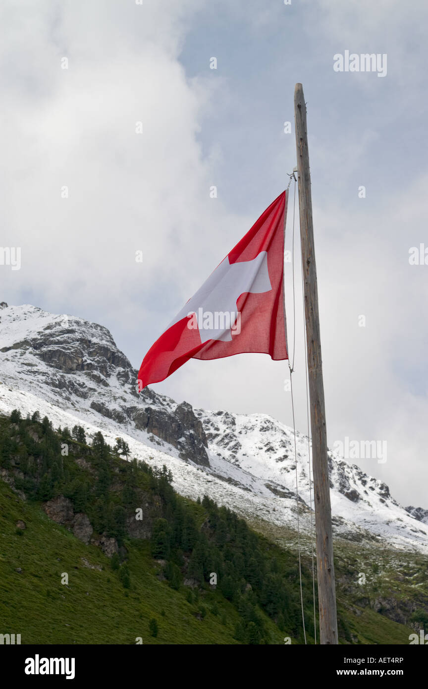 Swiss flag and Swiss Alps Stock Photo - Alamy