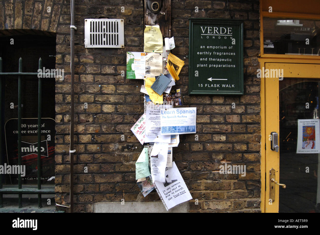 Personal advertising on a brick wall in Hampstead, London, UK Stock ...