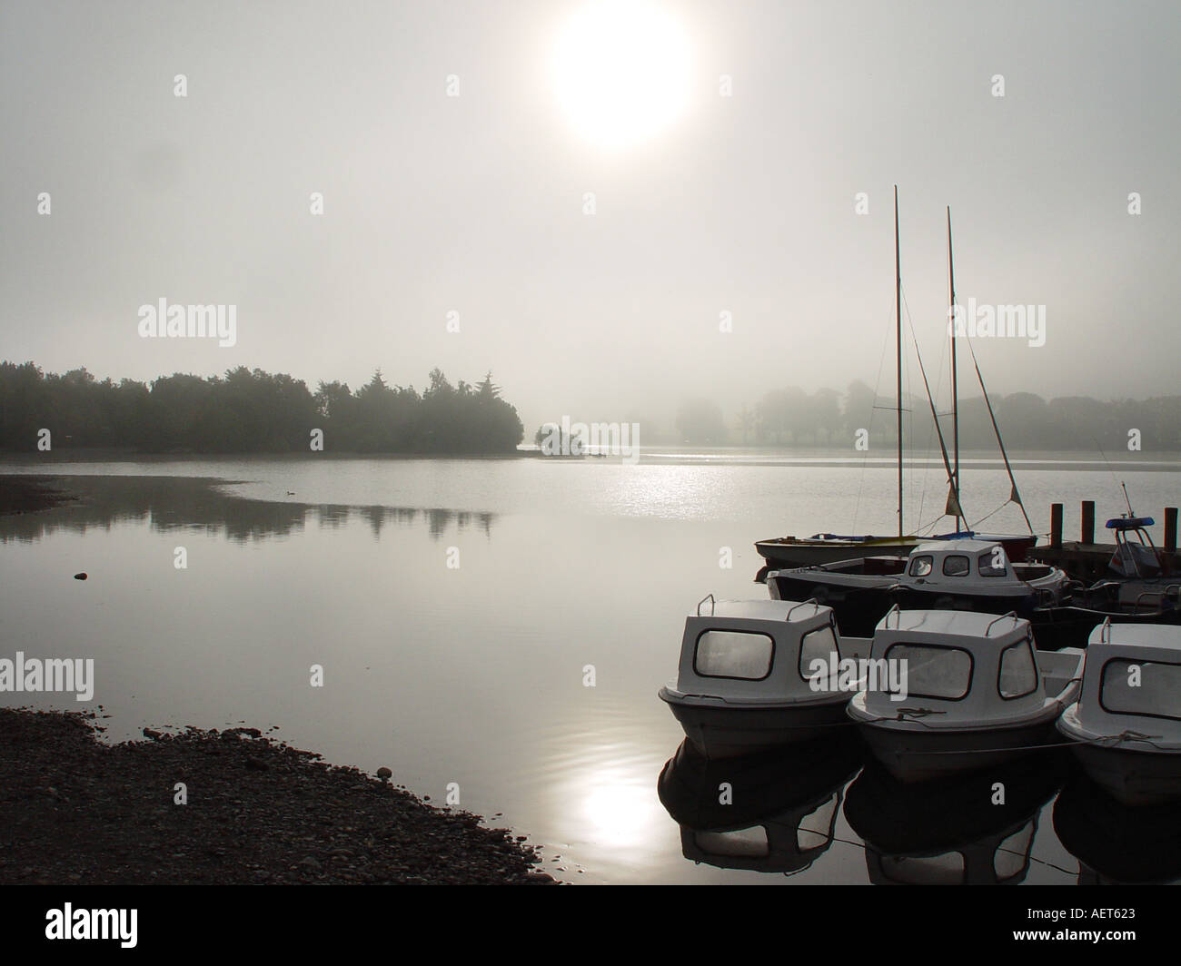 Boats on coniston water Lake conniston in the lake district Cumbria ...