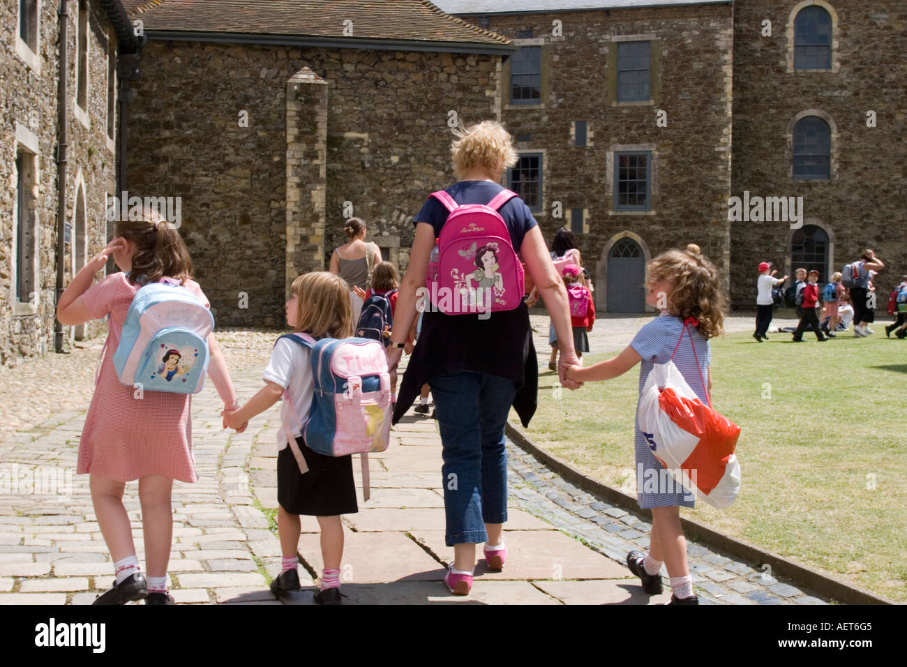 Children and teacher visiting historic castle hi-res stock photography ...