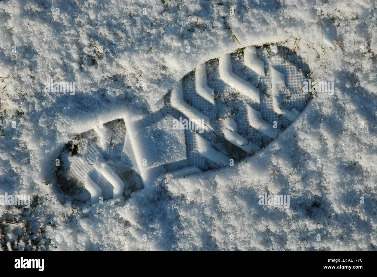 Footprint in Snow Stock Photo - Alamy