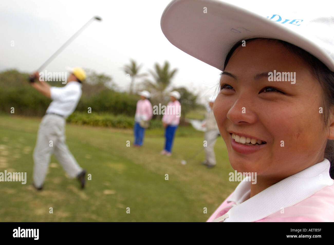 Golfers with caddies hi-res stock photography and images - Alamy