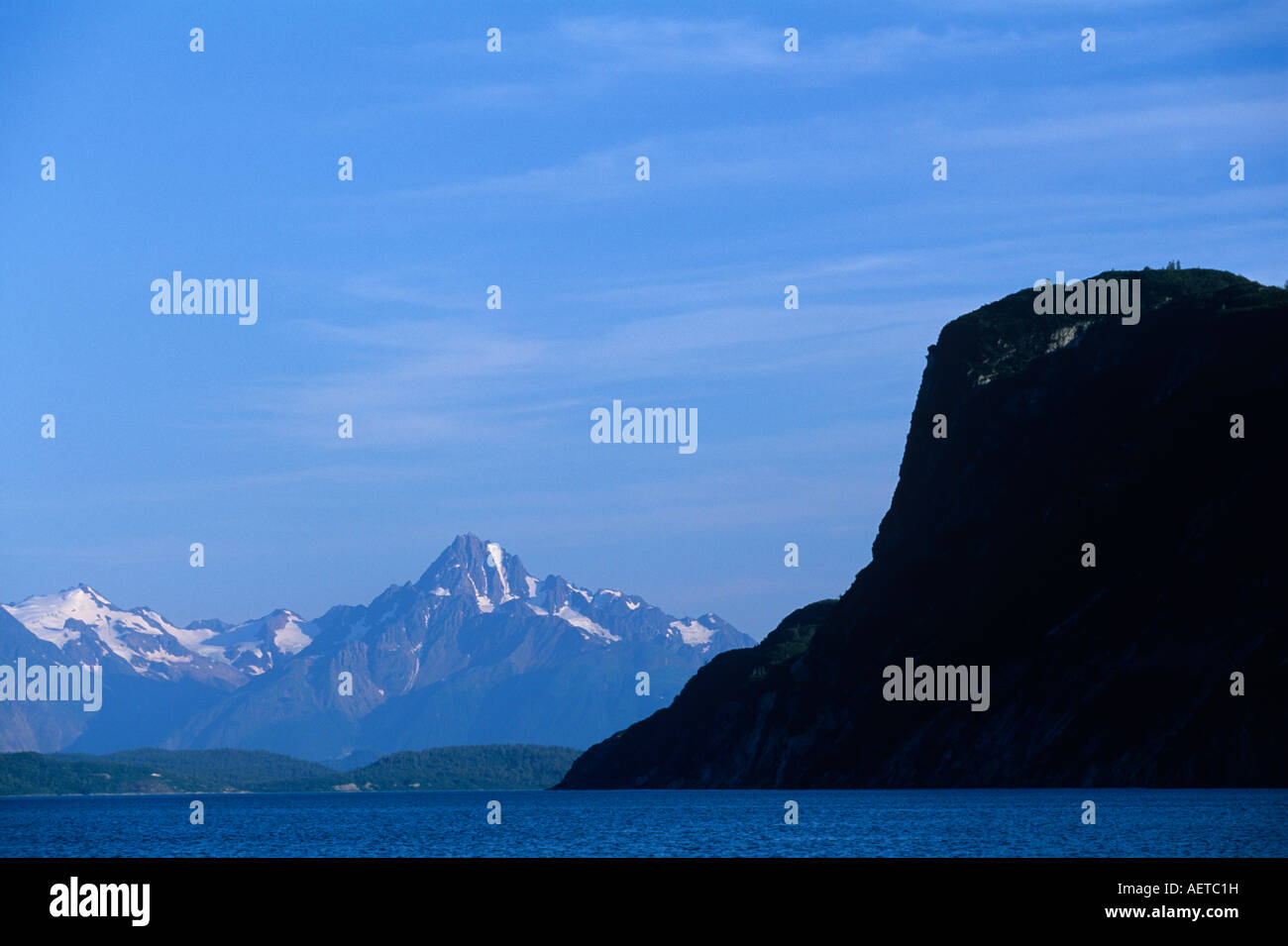 USA Alaska Glacier Bay National Park Steeps cliffs line Muir Inlet with ...