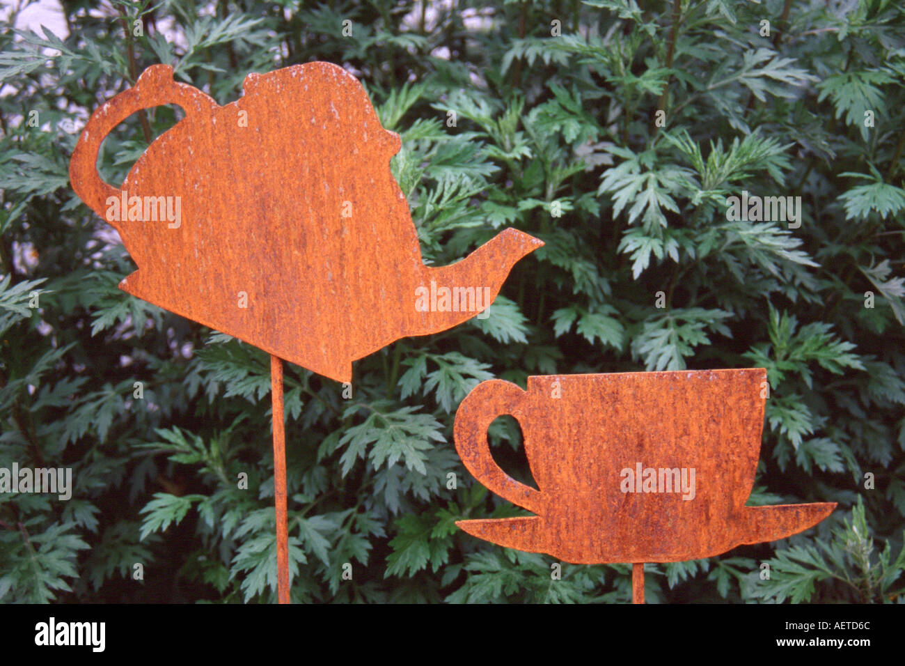 rusty metal art tea pot and cup Stock Photo - Alamy