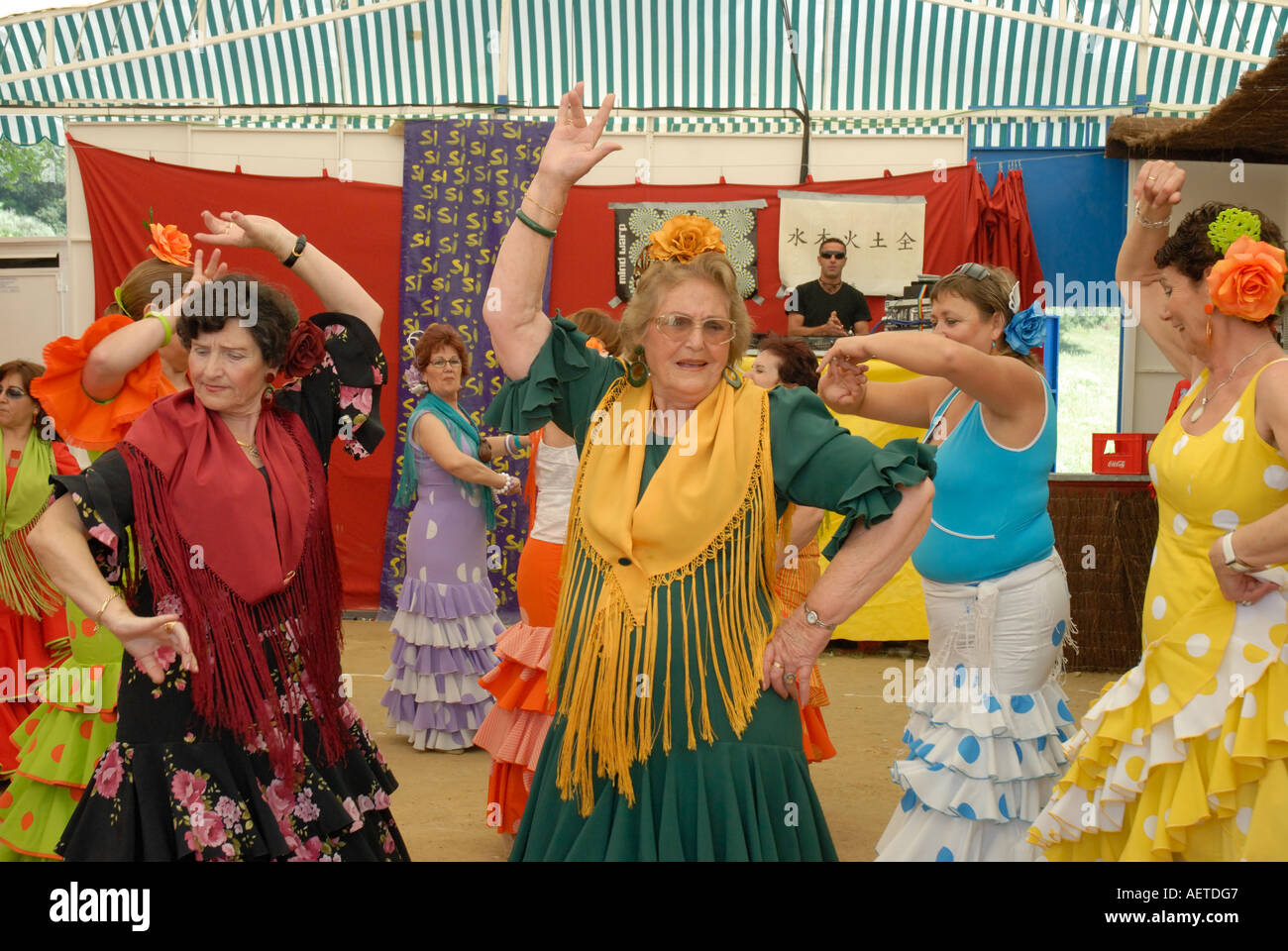 Middle-aged Spanish women dance flamenco on ladies' day at Vejer spring ...