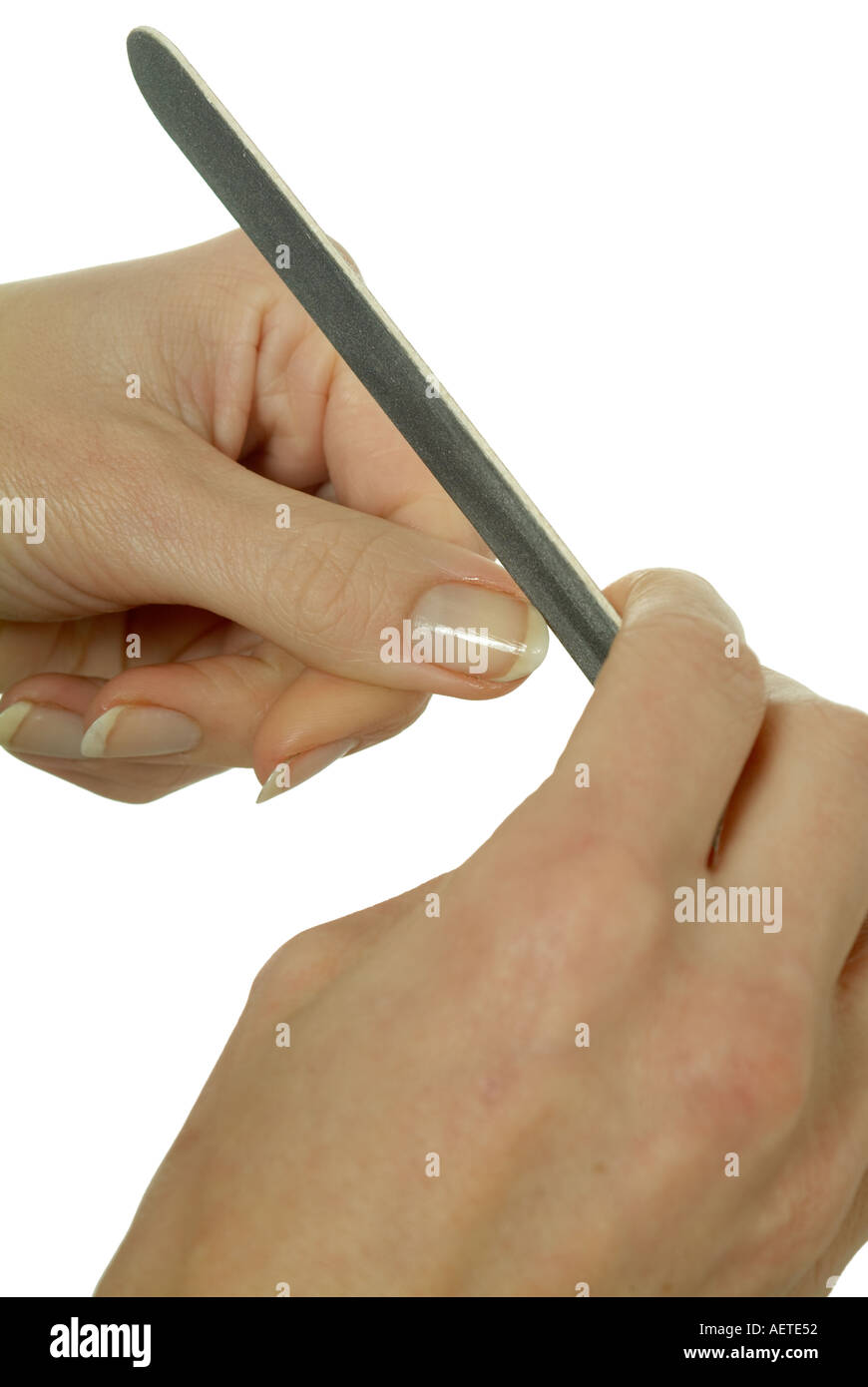 woman filing her nails with an emery board Stock Photo - Alamy