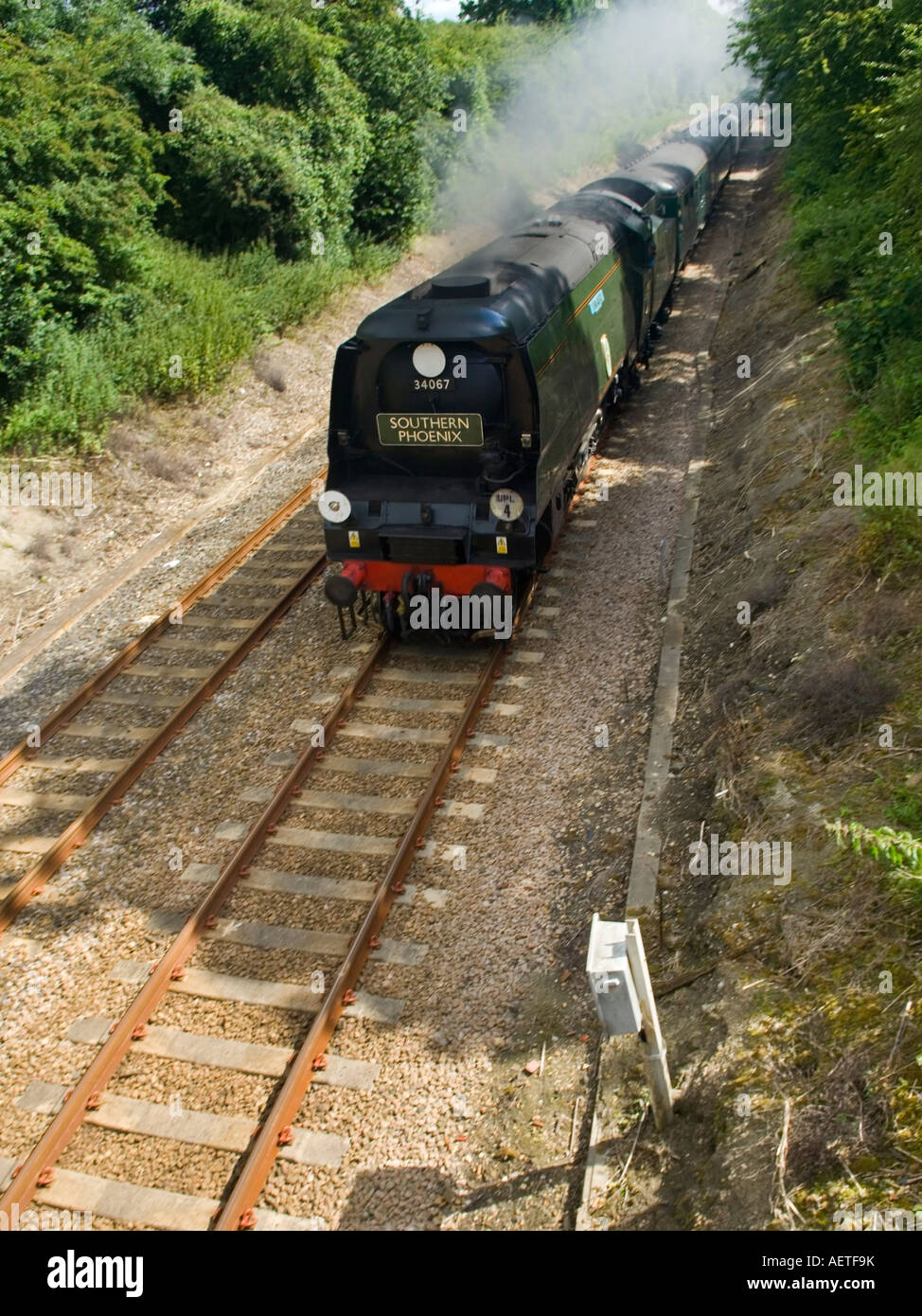 34067 Tangmere Southern Phoenix Steam locomotive on the railtrack in ...