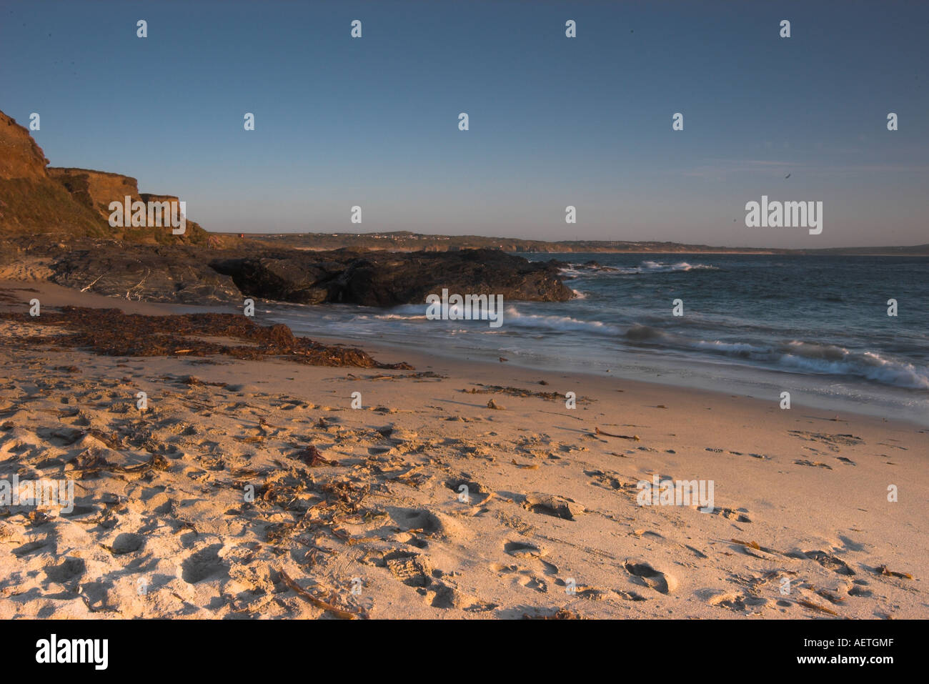 Cornish beach at sunset Godrevy Head Stock Photo - Alamy