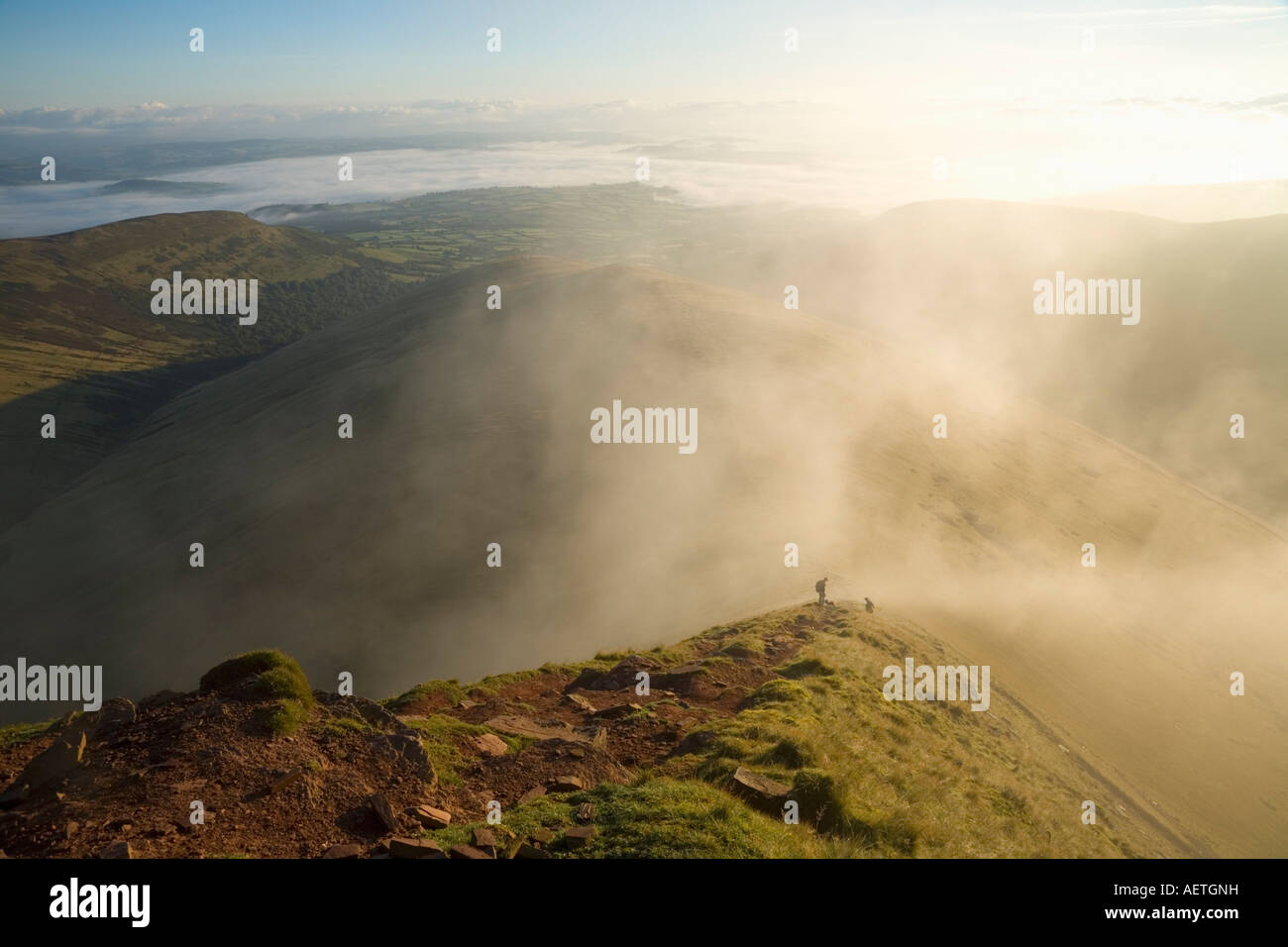 Hikers descending Cribyn Brecon Beacons National Park Powys Wales Stock ...