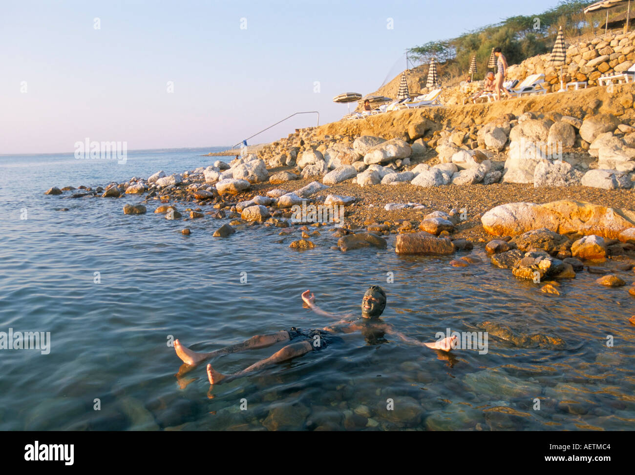 Man floating in Dead Sea Jordan Middle East Stock Photo - Alamy