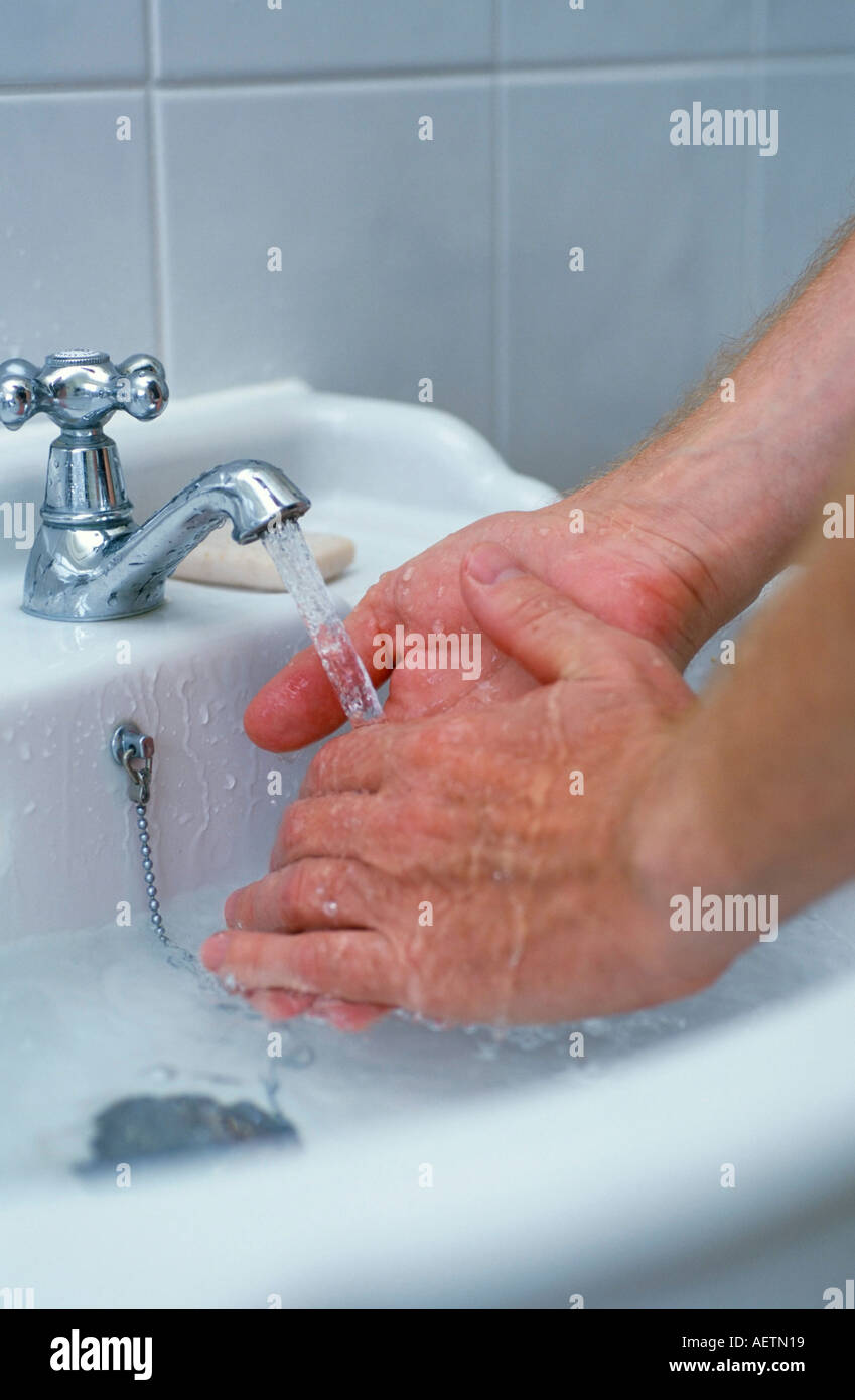 Hands washing hi-res stock photography and images - Alamy