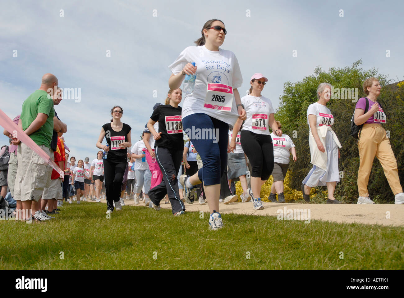 Girls and women running in the Cancer Research Race for Life in Oxford ...