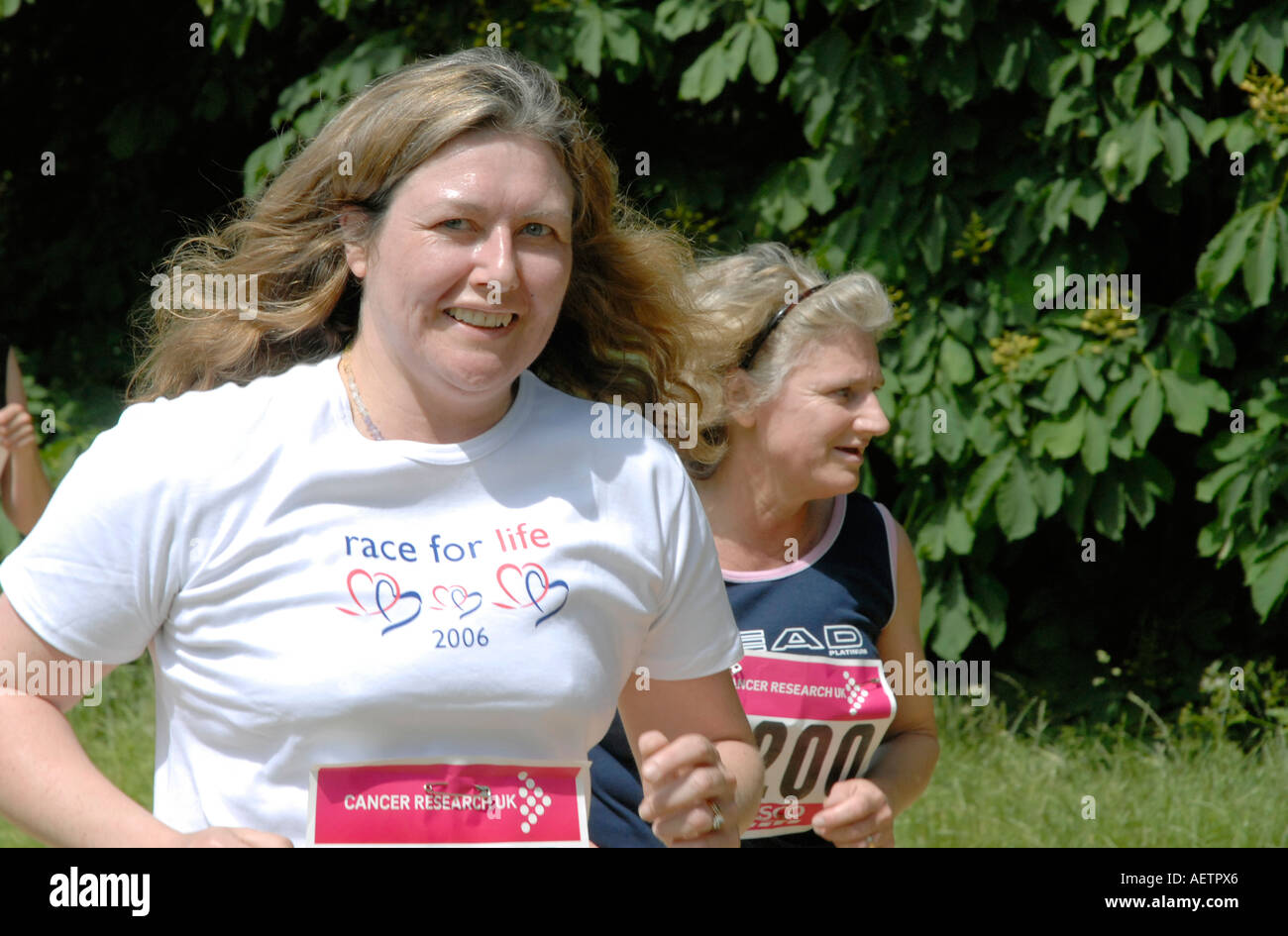 Girls and women running in the Cancer Research Race for Life in Oxford ...
