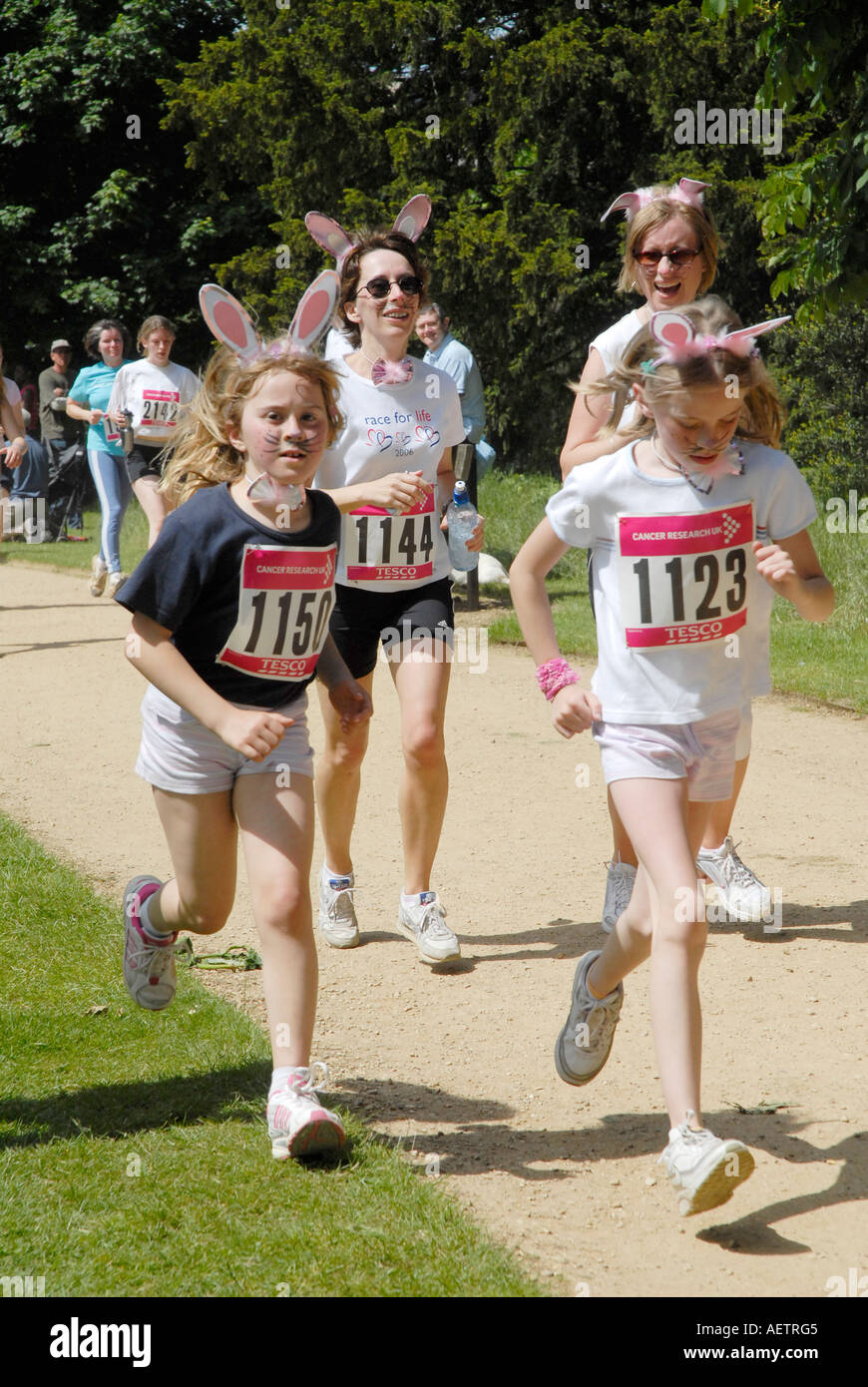 Girls and women running in the Cancer Research Race for Life in Oxford ...