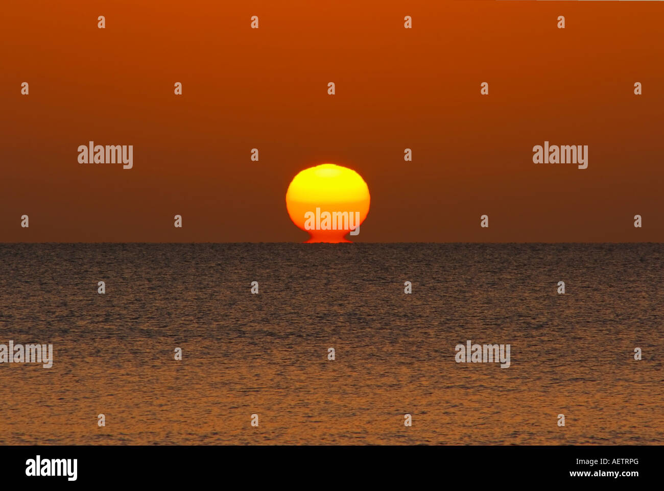 The Spring Sun rising over the Suffolk Coast Stock Photo - Alamy