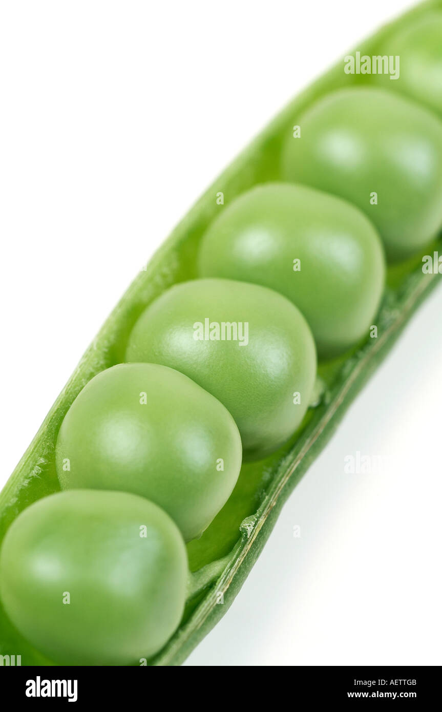 Macro pea pod on white background Stock Photo - Alamy