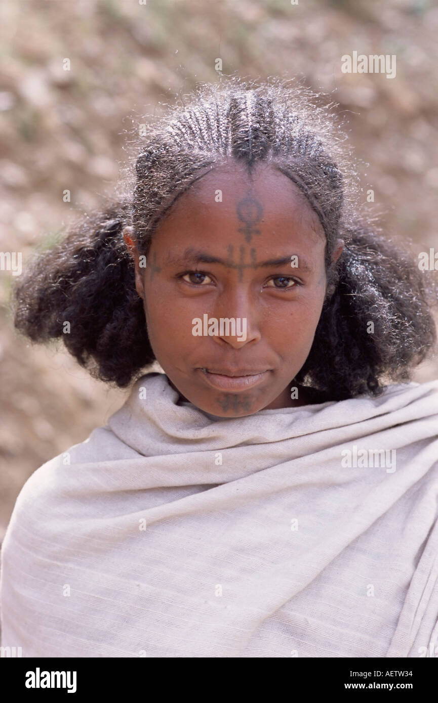 Head and shoulders portrait of a young Gourage woman with facial tattoo ...