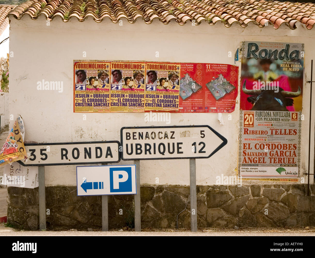 Roadsigns a posters for 'torres' bullfights Stock Photo - Alamy